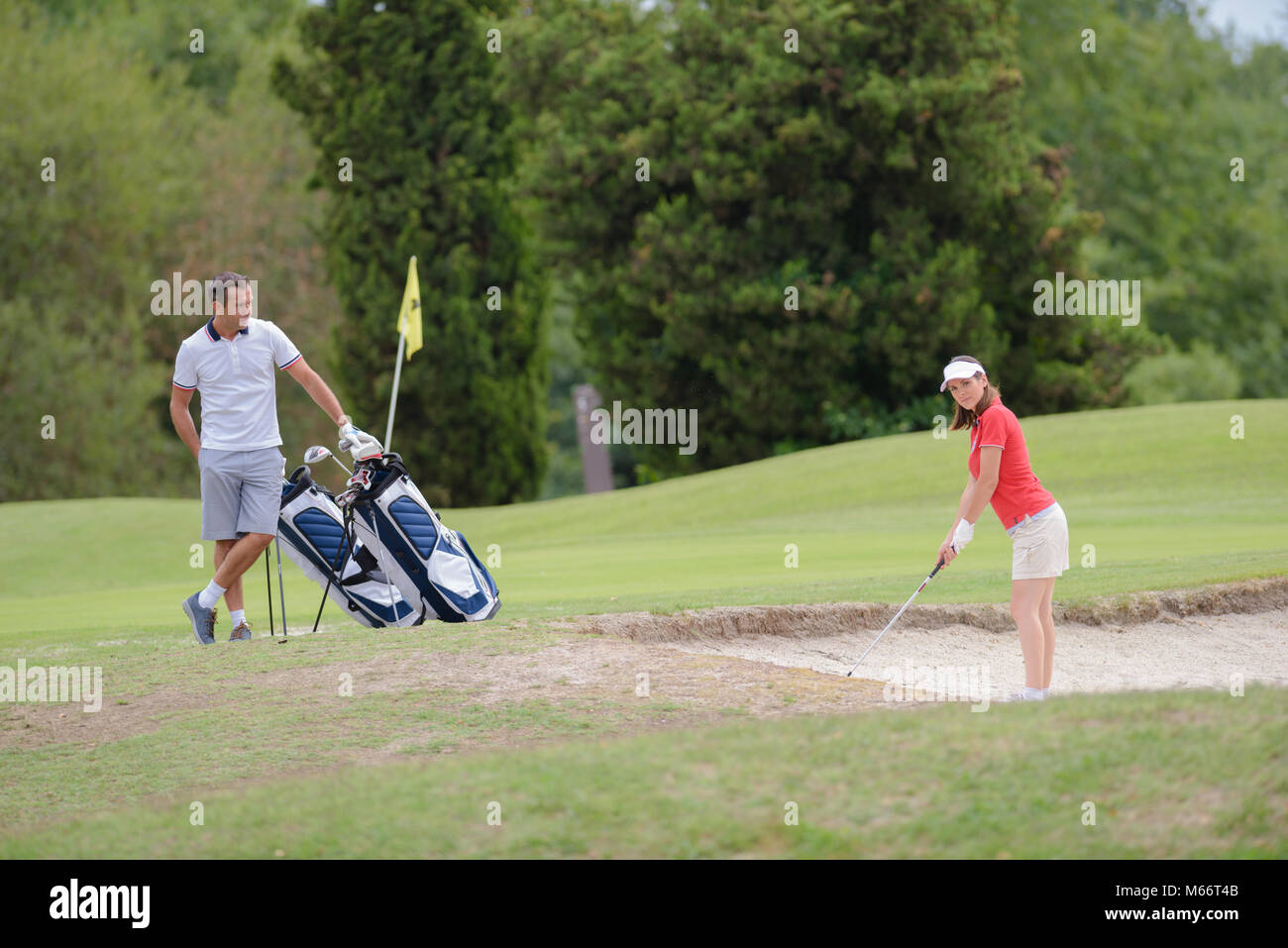 woman's turn for golf Stock Photo - Alamy