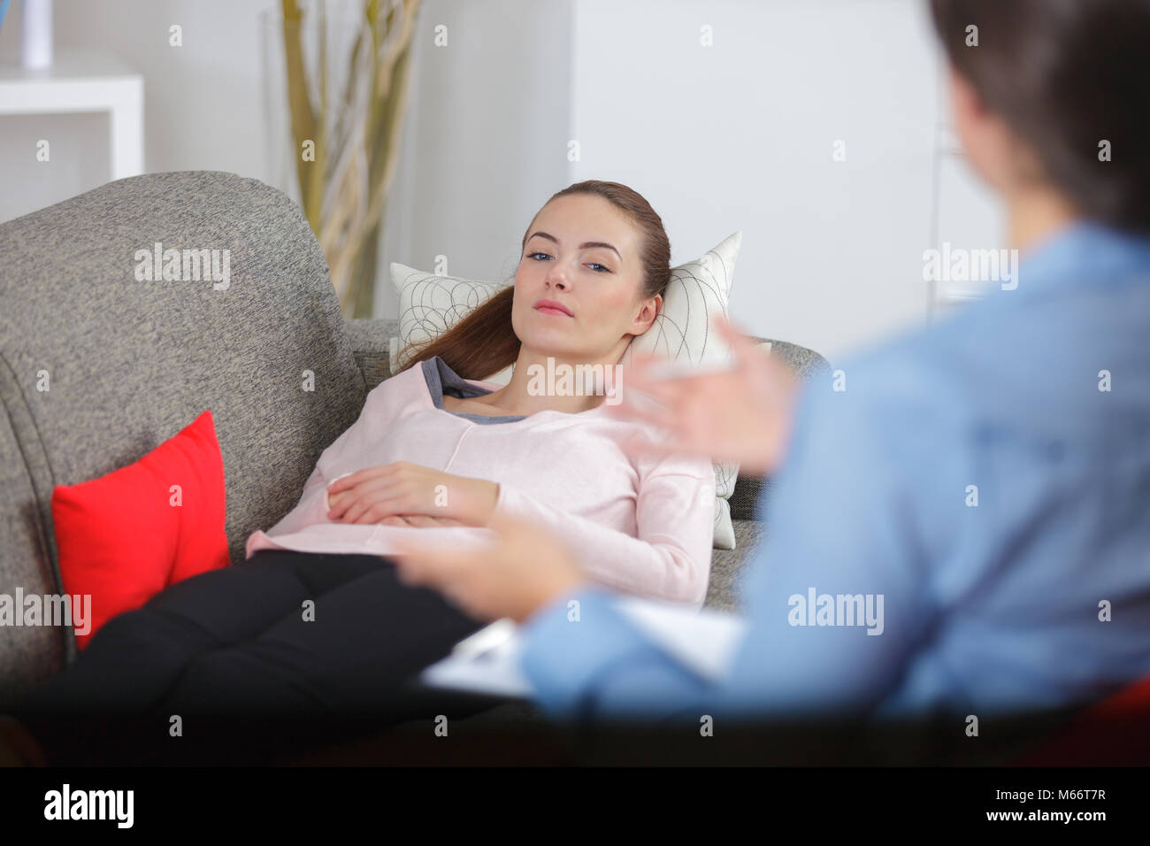 attentive teenager visiting female psychologist Stock Photo - Alamy