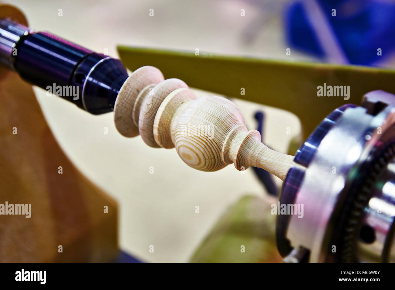 Wooden workpiece in a lathe for woodworking Stock Photo - Alamy