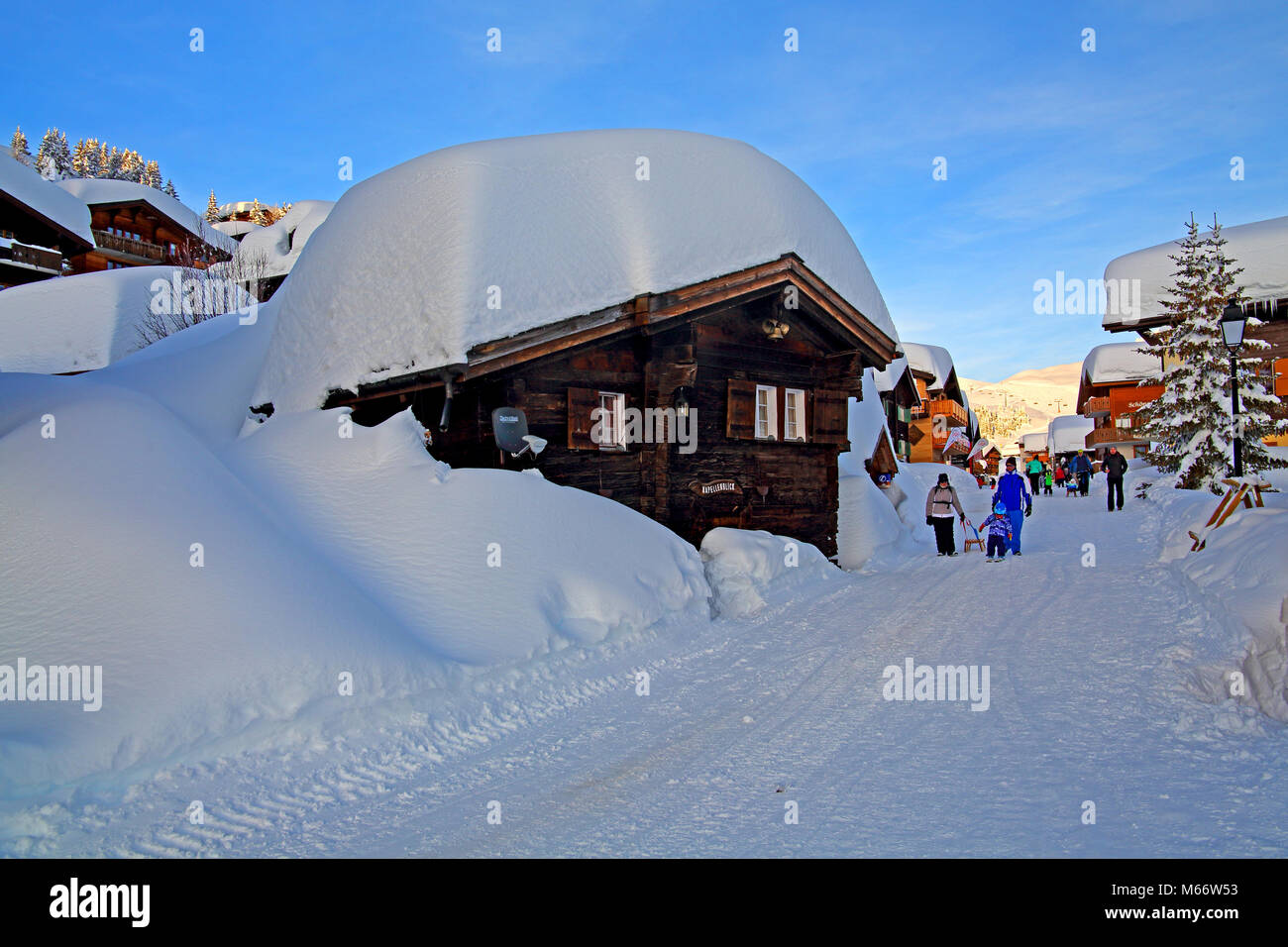 Village road with snow-covered chalets, Bettmeralp, Aletsch area, Upper ...