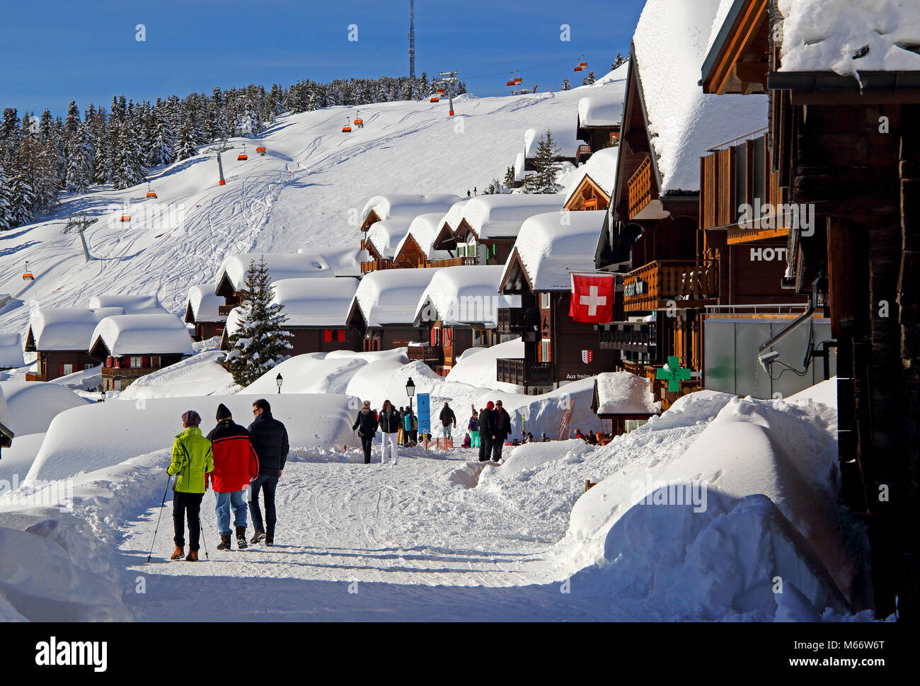Village road with snow-covered chalets, Bettmeralp, Aletsch area, Upper ...