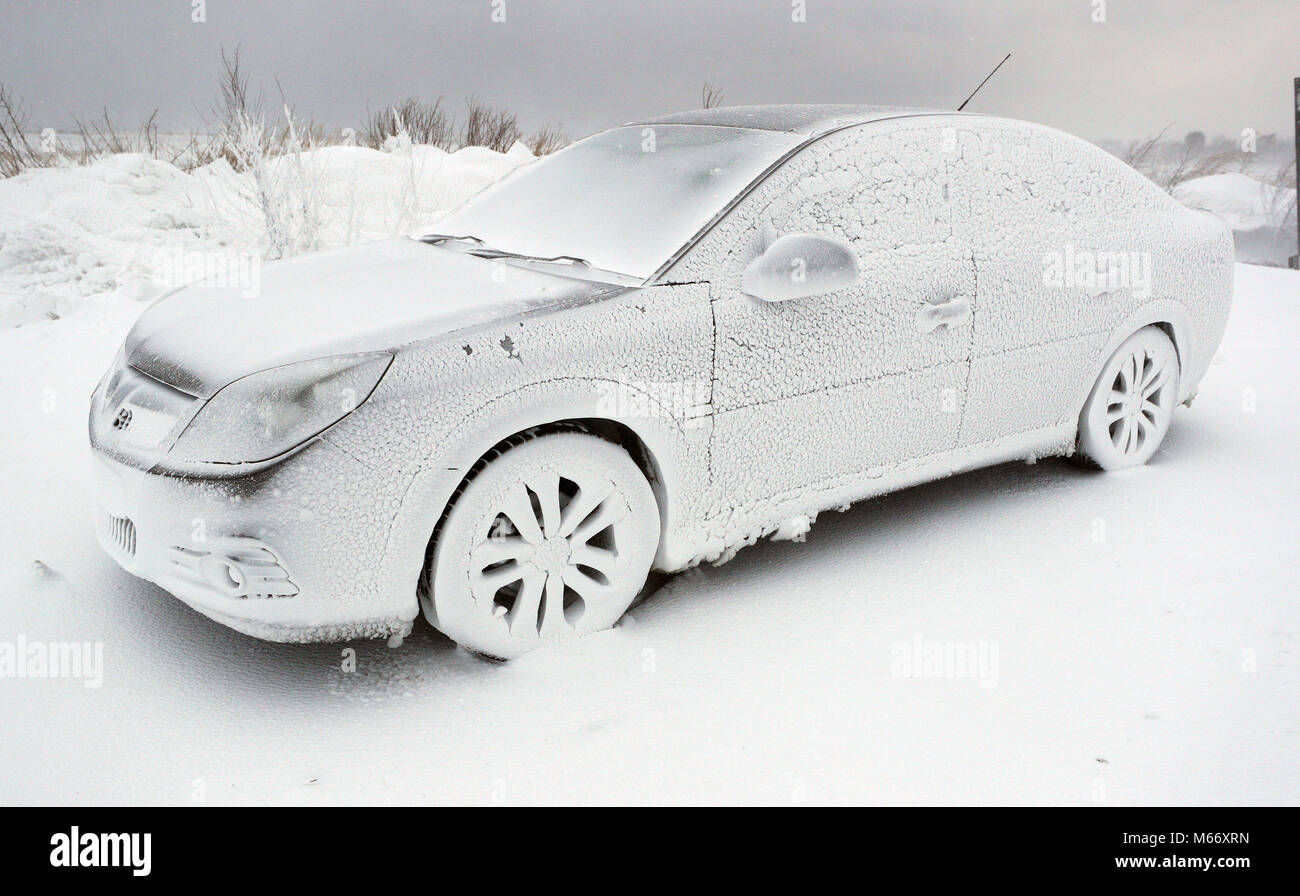 A stranded car covered in snow in Whitley Bay in Tyne and Wear as storm ...