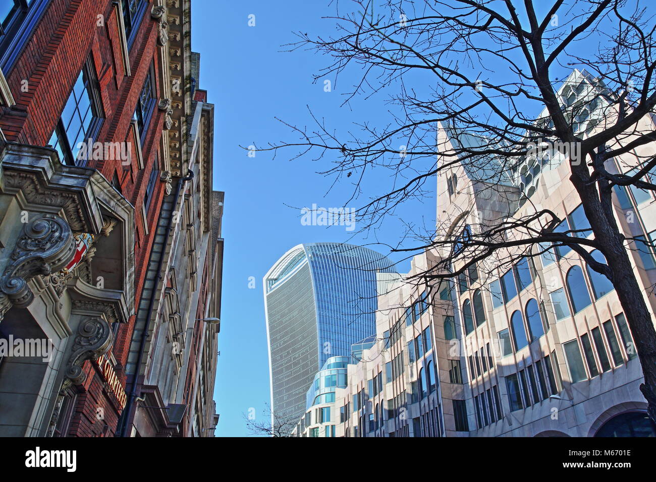 LONDON, UK – FEBRUARY 25, 2018: Colorful modern and old facades on ...