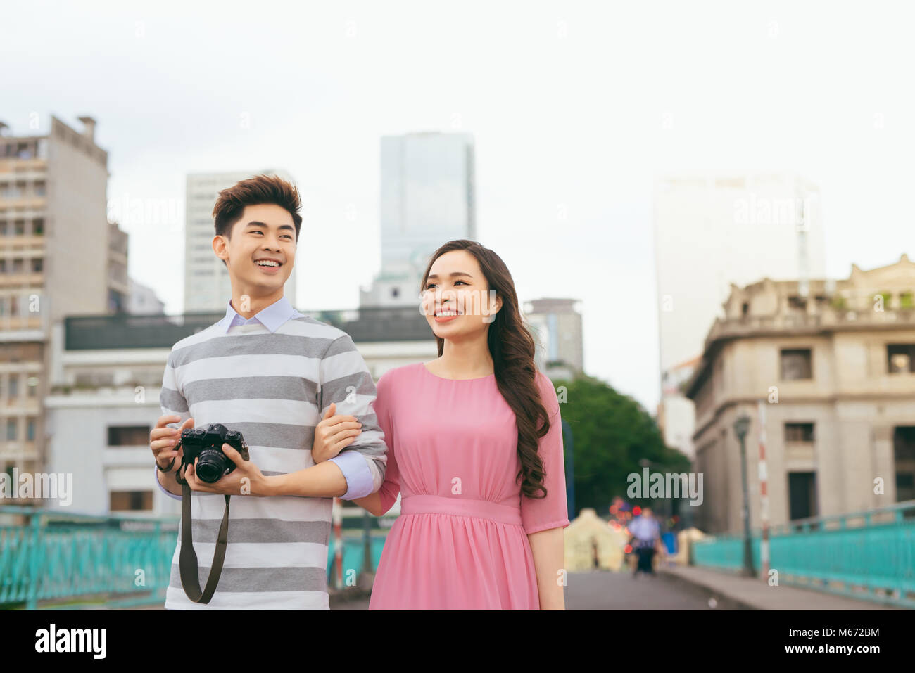 Young lovers walking around city on vacation, enjoying traveling ...