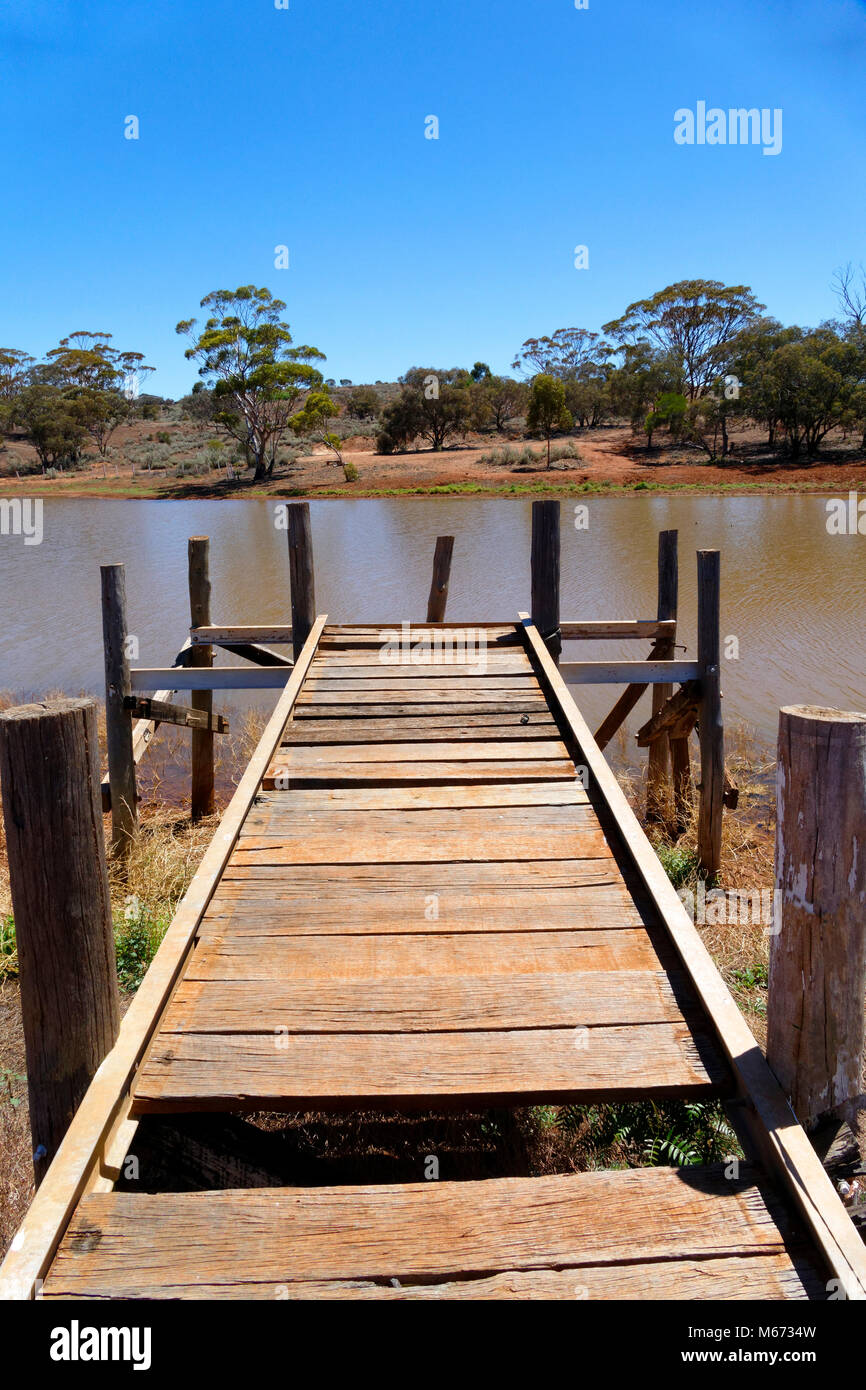 Old damaged wood pier on edge of lake, Murchison, Western Australia ...