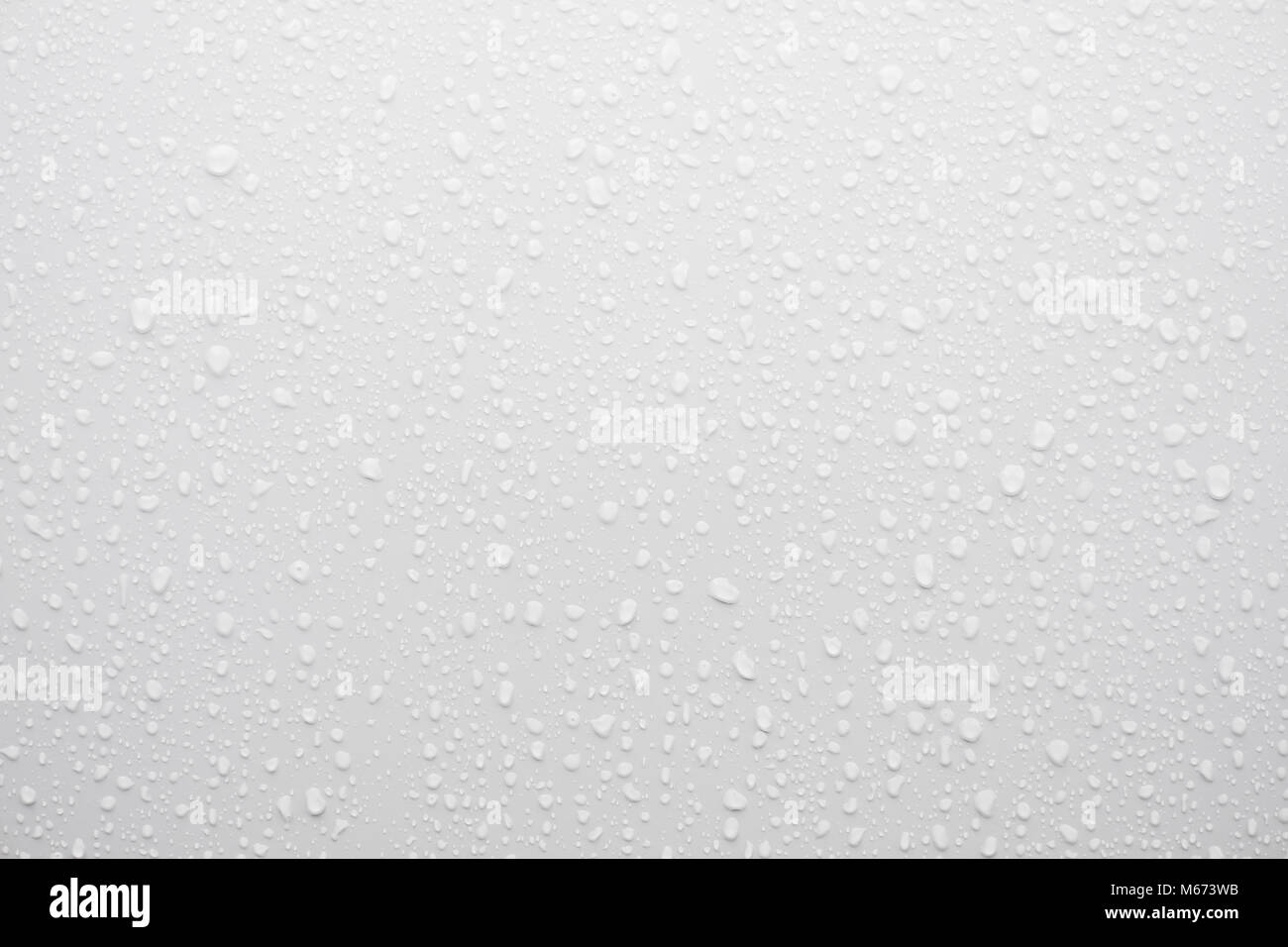 water drop on white surface as background Stock Photo - Alamy