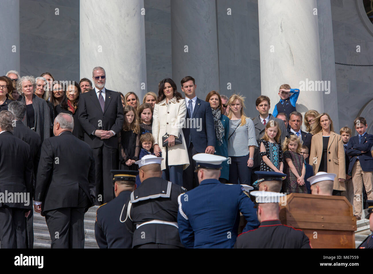 Washington, United States Of America. 28th Feb, 2018. Family wait for ...
