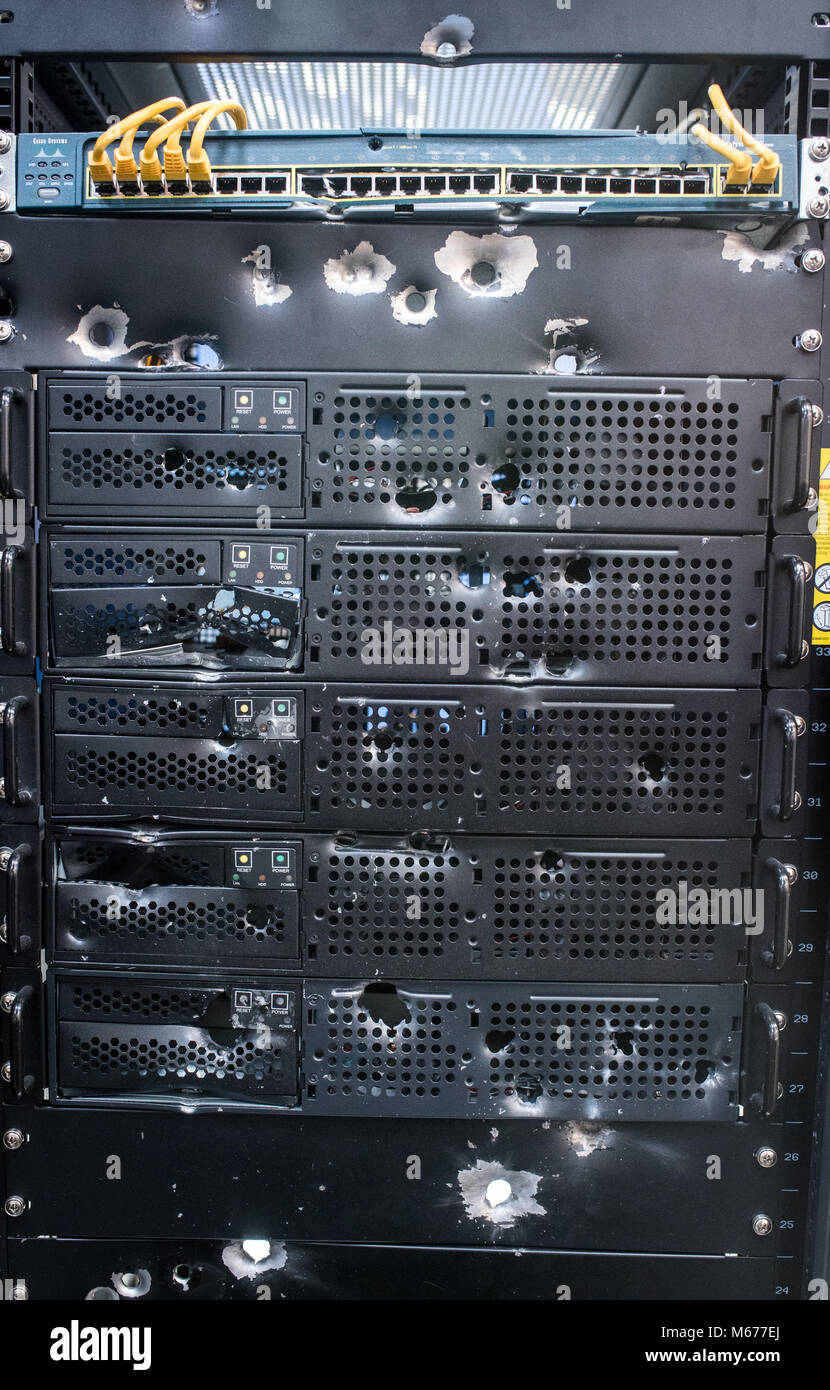 Hanover, Germany. 14th Mar, 2016. Decorative bullet holes in a server ...