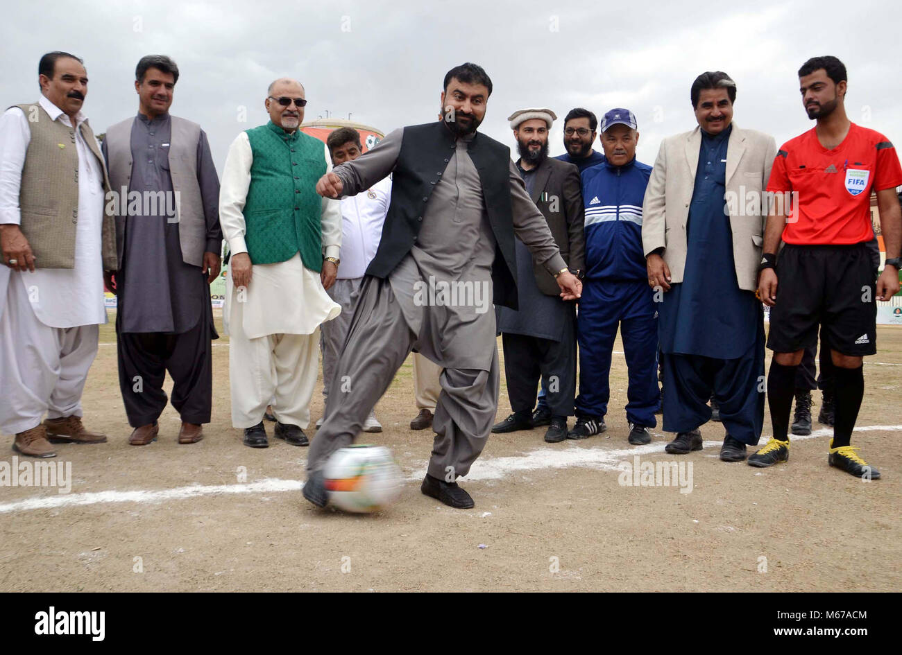 Balochistan Home Minister, Sarfraz Bugti kicks the ball during ...