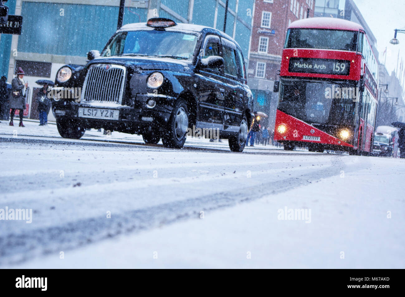 London, United Kingdom 1st March 2018 The famous black cabs and red ...