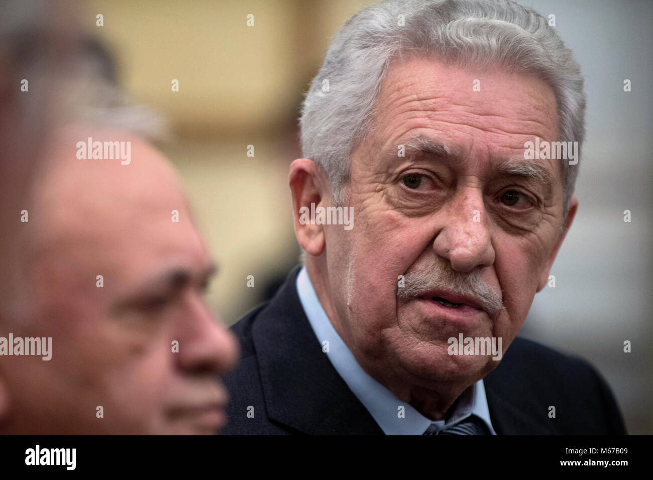 Greek alternate Defence Minister Fotis Kouvelis (R) attends his ...