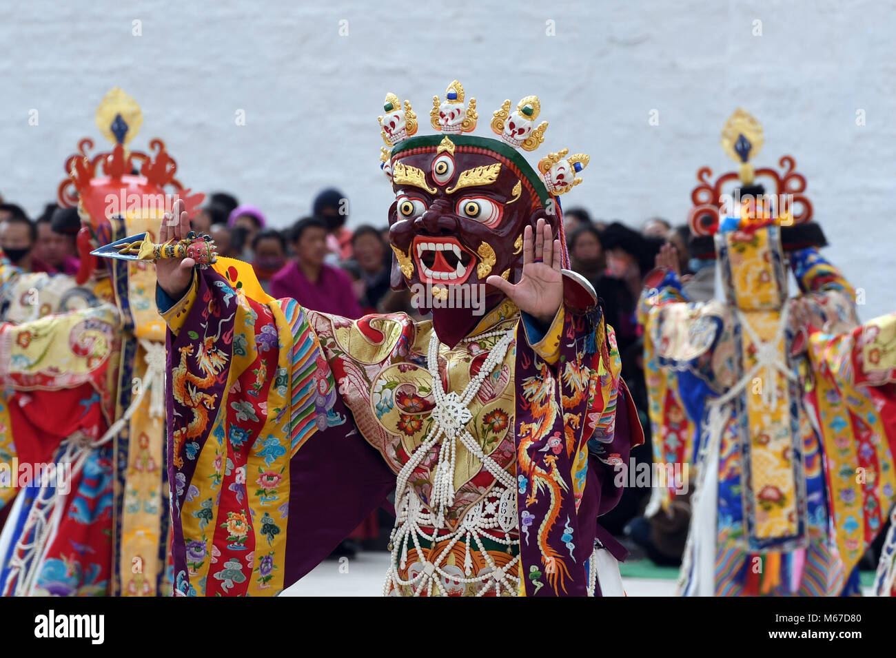 Xiahe. 1st Mar, 2018. Monks perform dance during a ritual at Labrang ...