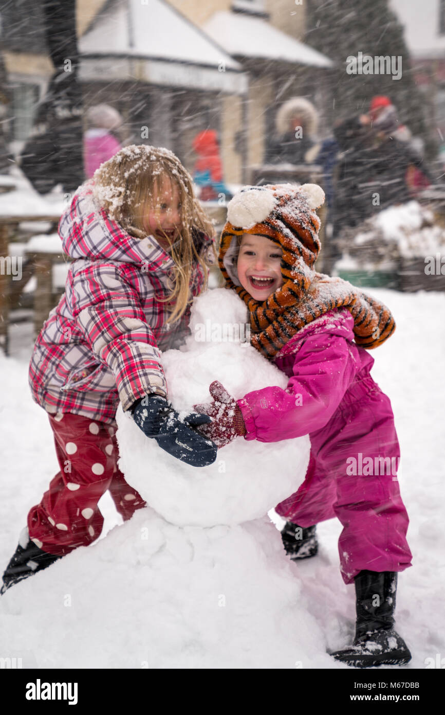 Fun in the snow Stock Photo - Alamy