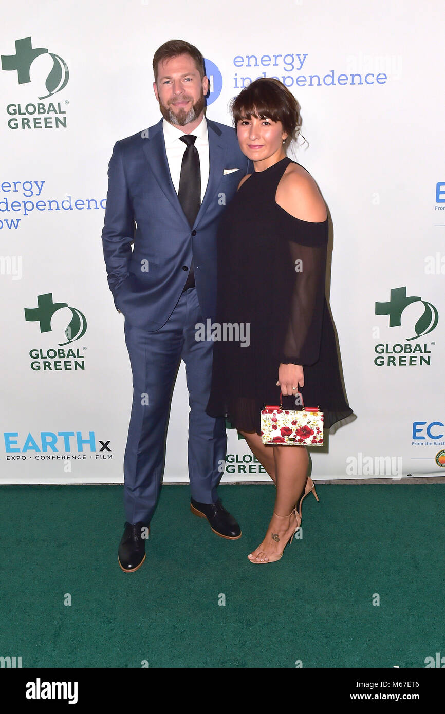 Brian Goldstein and guest attending the15th annual Global Green pre ...