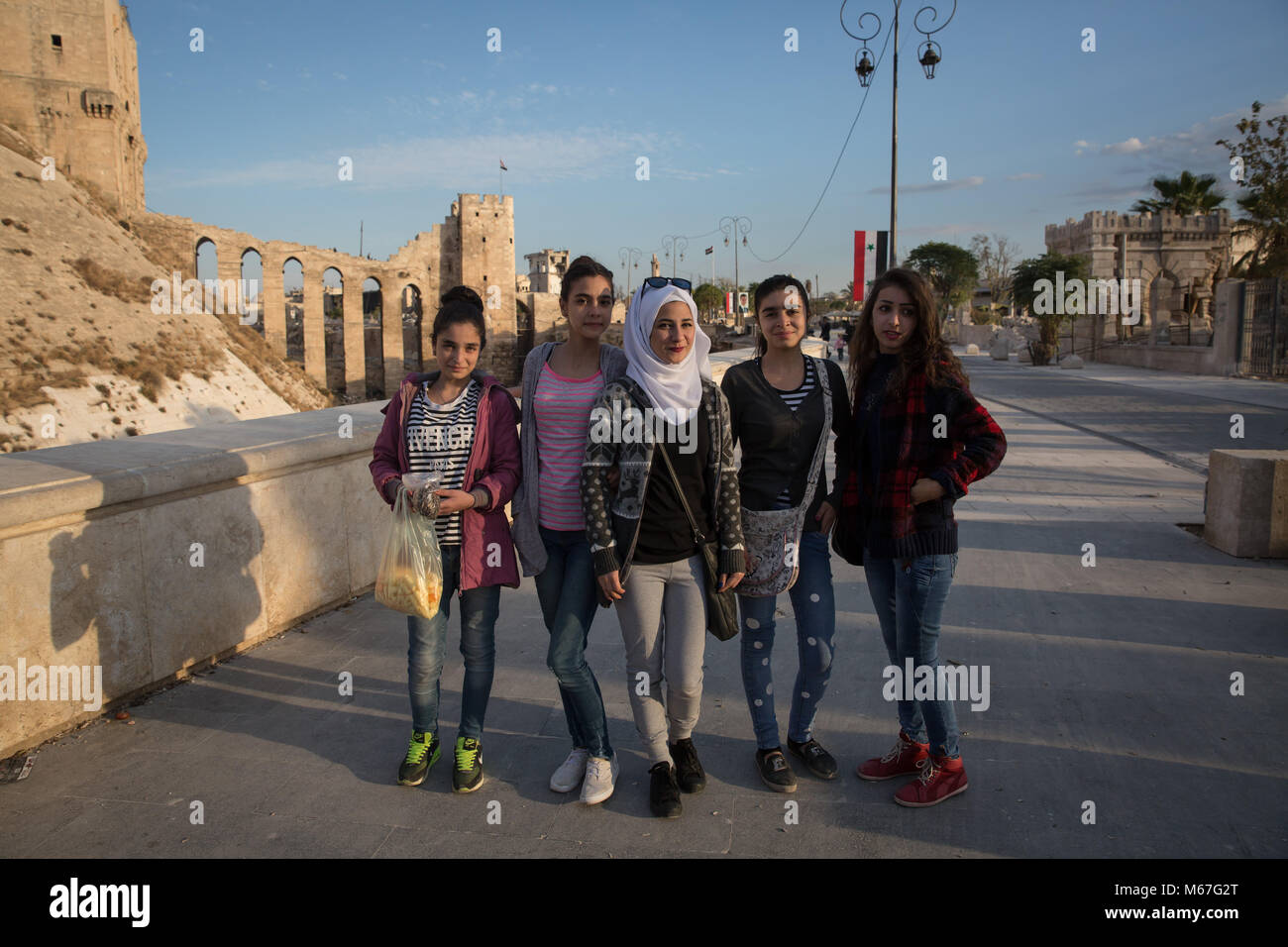 Aleppo, Syria. 2nd Nov, 2017. A family of girls walk by Aleppo's famous ...