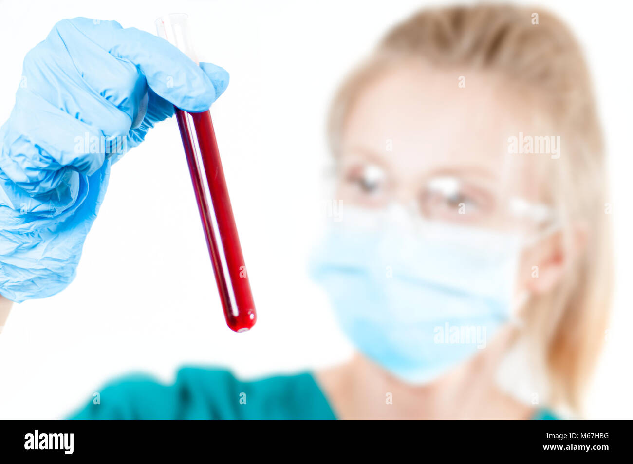 Female doctor doing the blood test in medical laboratory Stock Photo ...