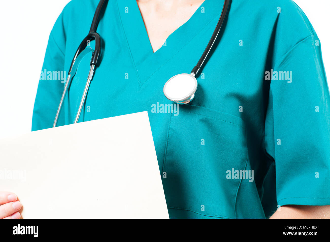Doctor. Healthcare And Medicine. Nurse in green scrubs with documents ...