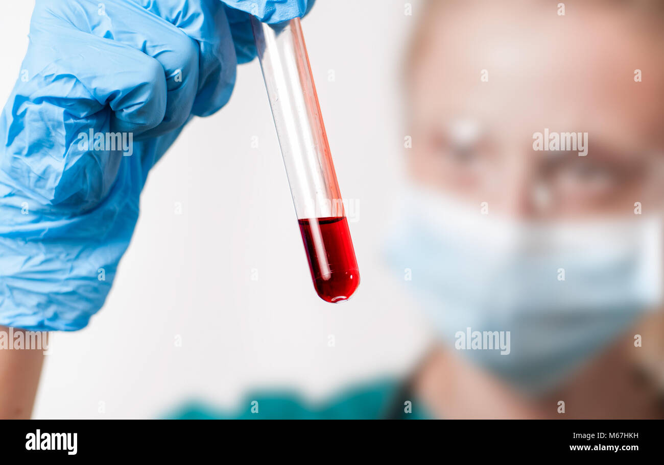 Female doctor doing the blood test in medical laboratory Stock Photo ...