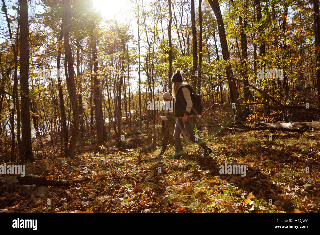 Hiking, camp, adventure, traveling and friendship concept. Girls ...