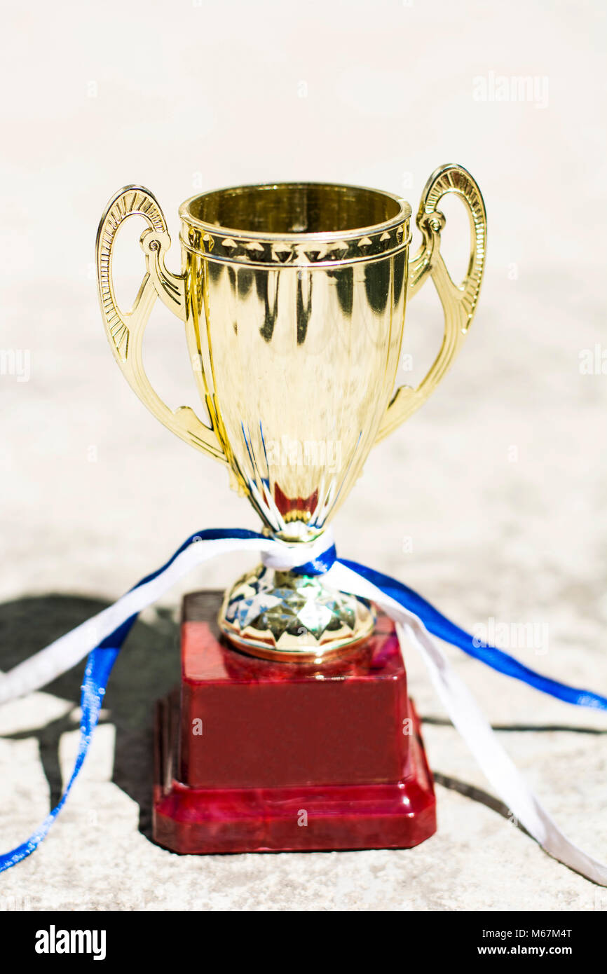 Golden trophy isolated Stock Photo - Alamy
