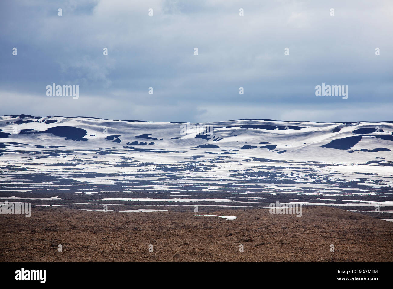 Beautiful Icelandic landscape. Green volcanic mountains in cloudy ...