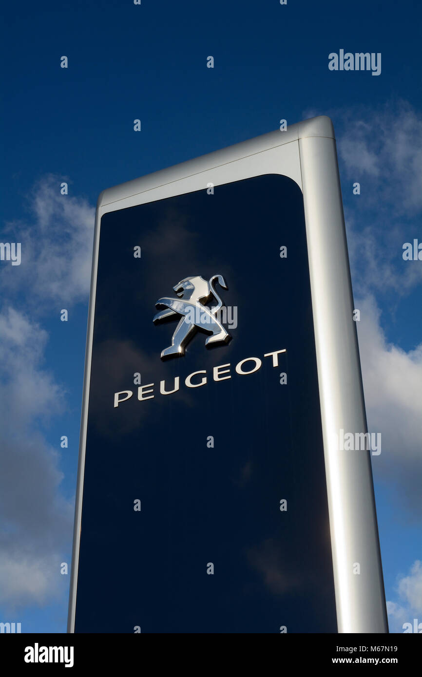 Peugeot dealership sign Stock Photo - Alamy