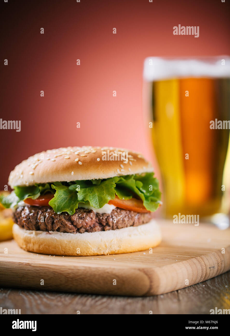 Fresh Hamburger With Beer Stock Photo - Alamy