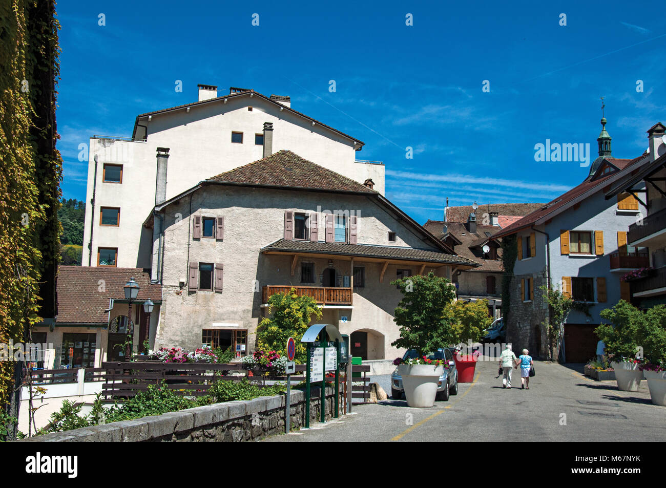 View of street and houses in the village of Talloires, near the Lake of ...