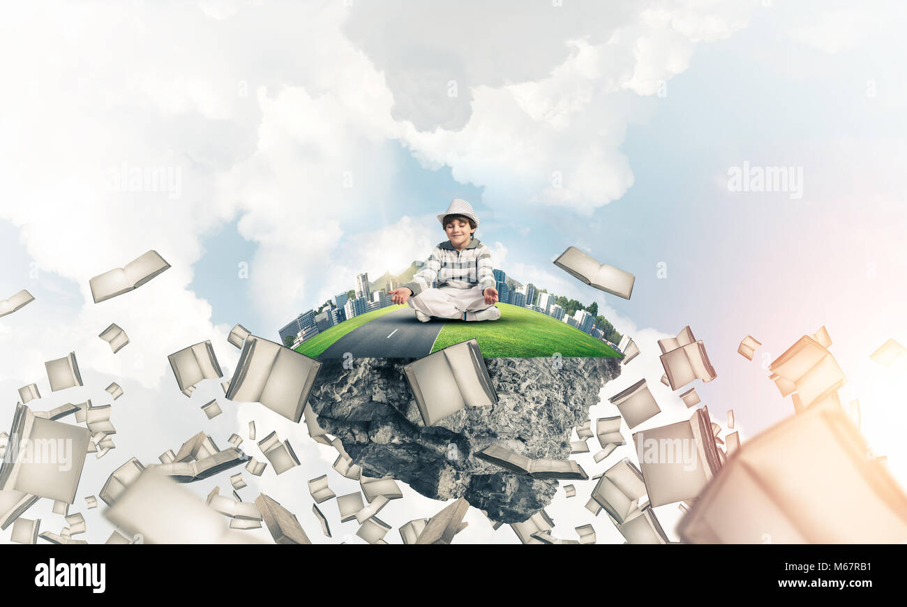 Little boy keeping mind conscious Stock Photo - Alamy