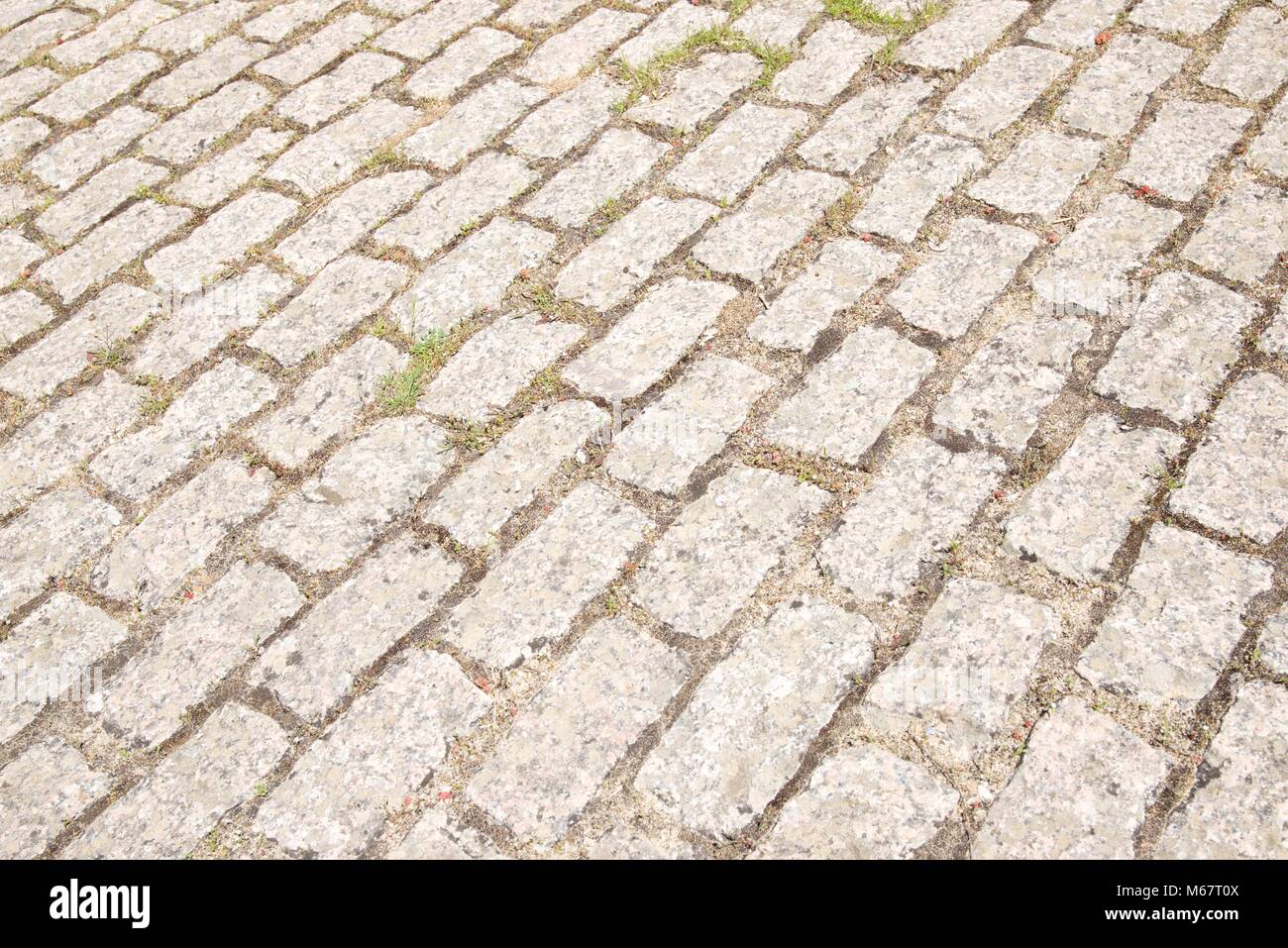 Floor of a street with stone tiles Stock Photo - Alamy