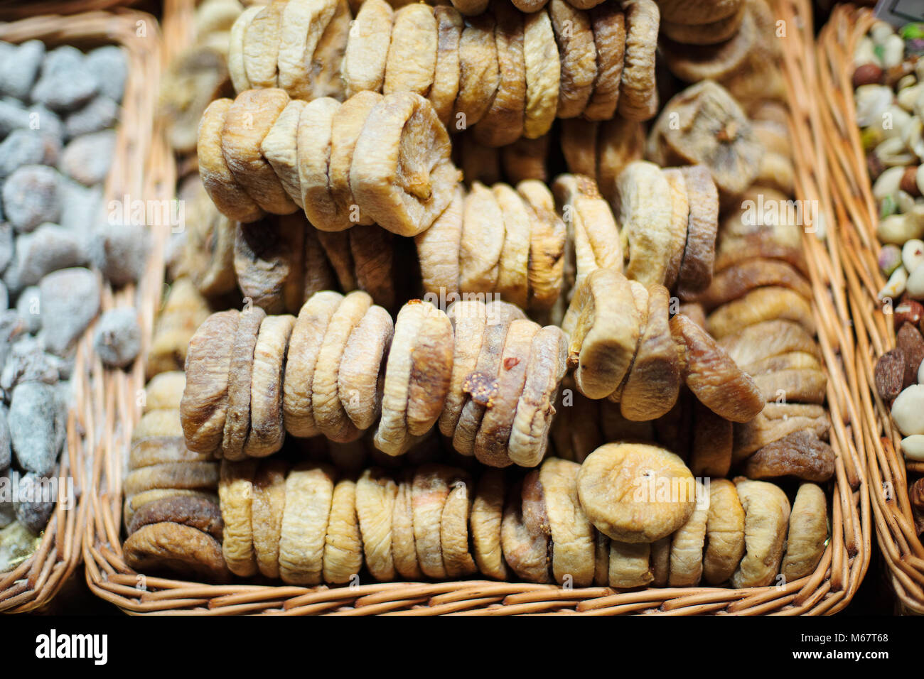 Healthy dried figs in a wooden basket Stock Photo - Alamy