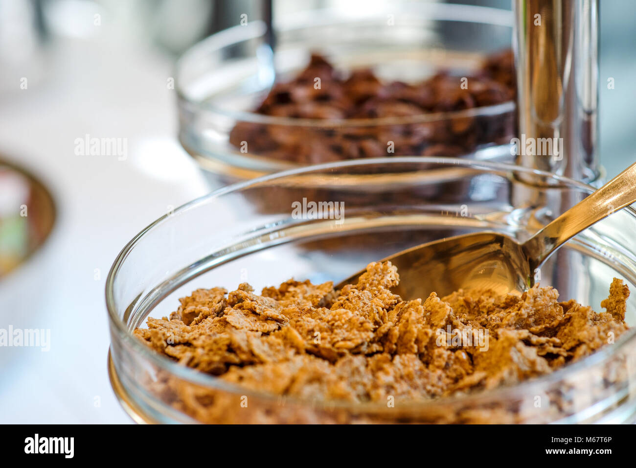 Breakfast cereals in a glass bowl Stock Photo - Alamy