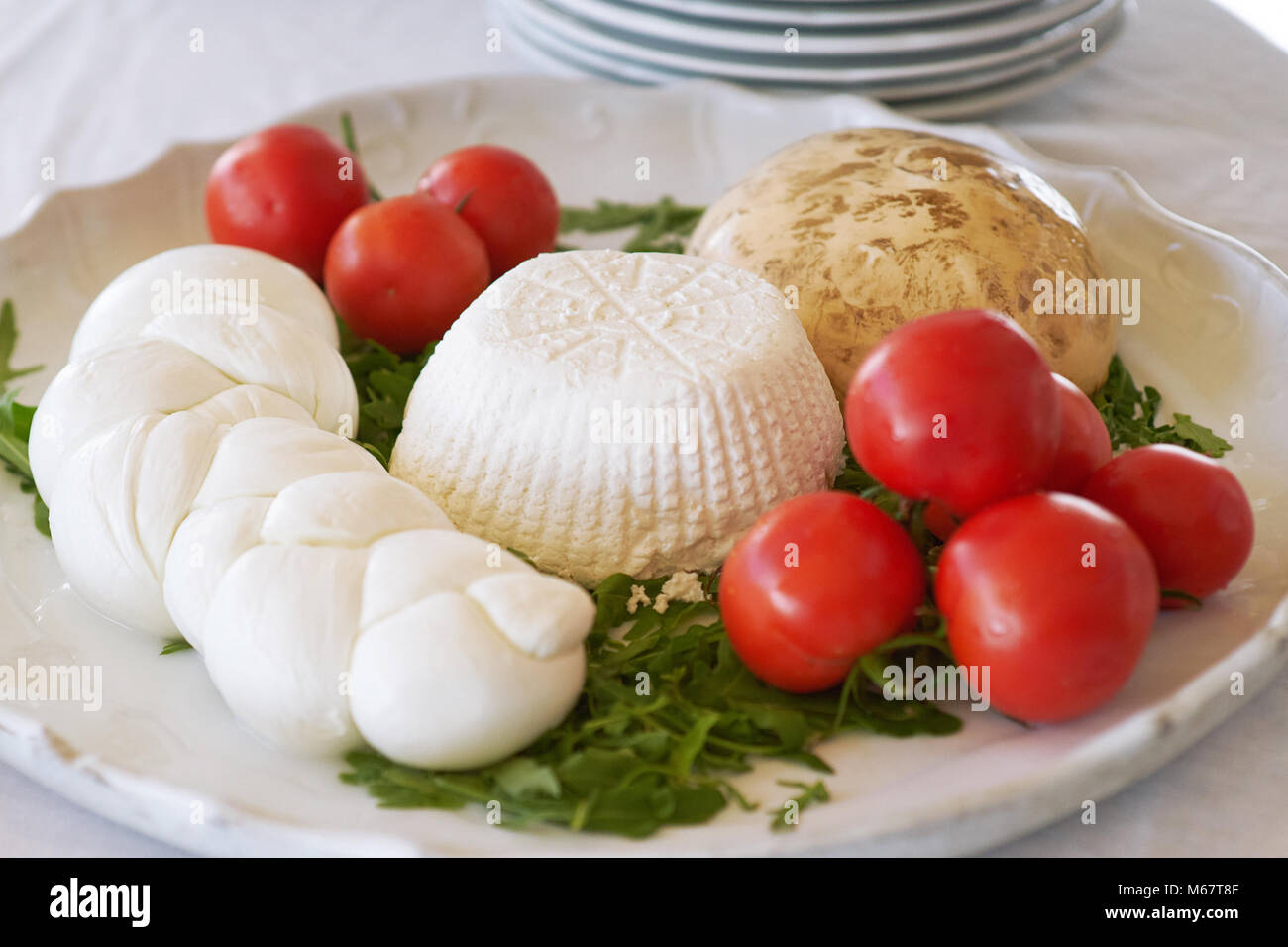 Mozzarella, ricotta cheese, tomatoes, rocket salad - delicious italian ...