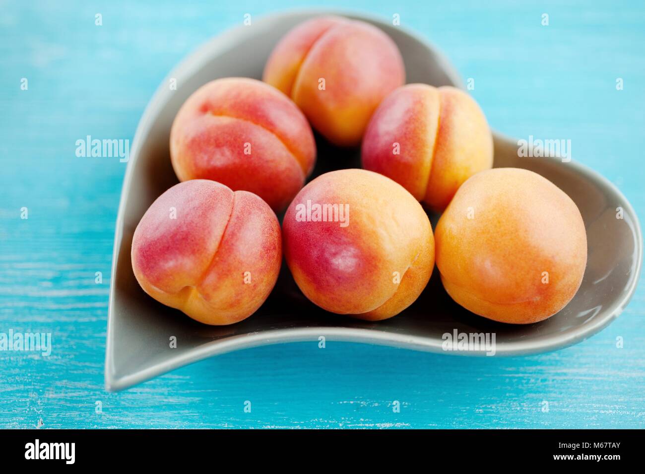 Peach heart fruit hi-res stock photography and images - Alamy