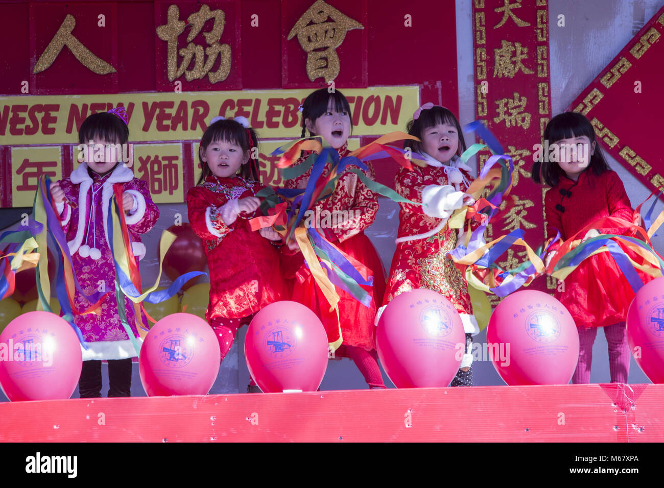 Chinese American children perform at a festival celebrating Chinese New ...