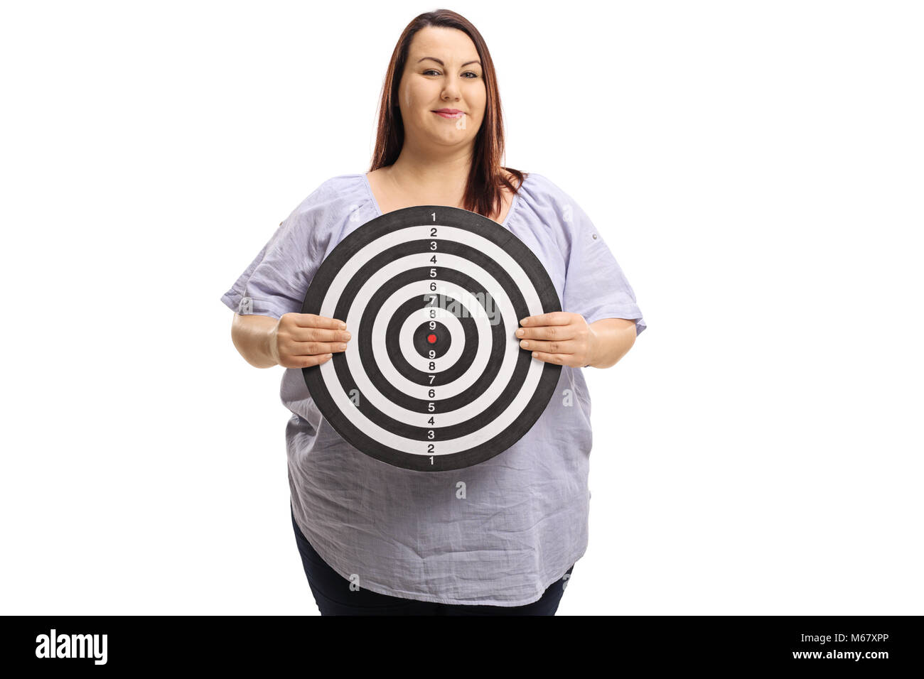 Overweight woman holding a target isolated on white background Stock ...