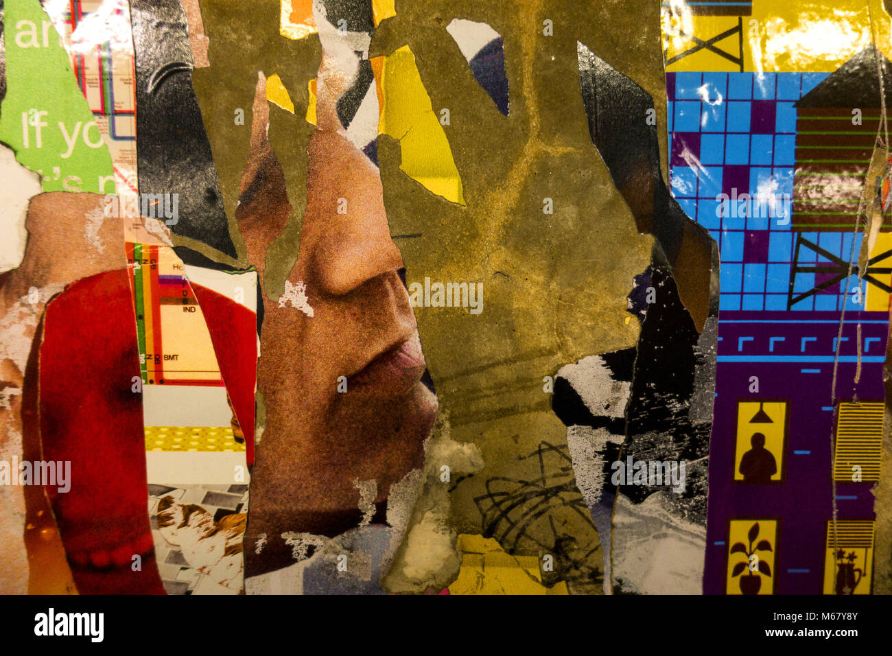 Pieces of peeled posters create a collage on the wall at a Brooklyn ...