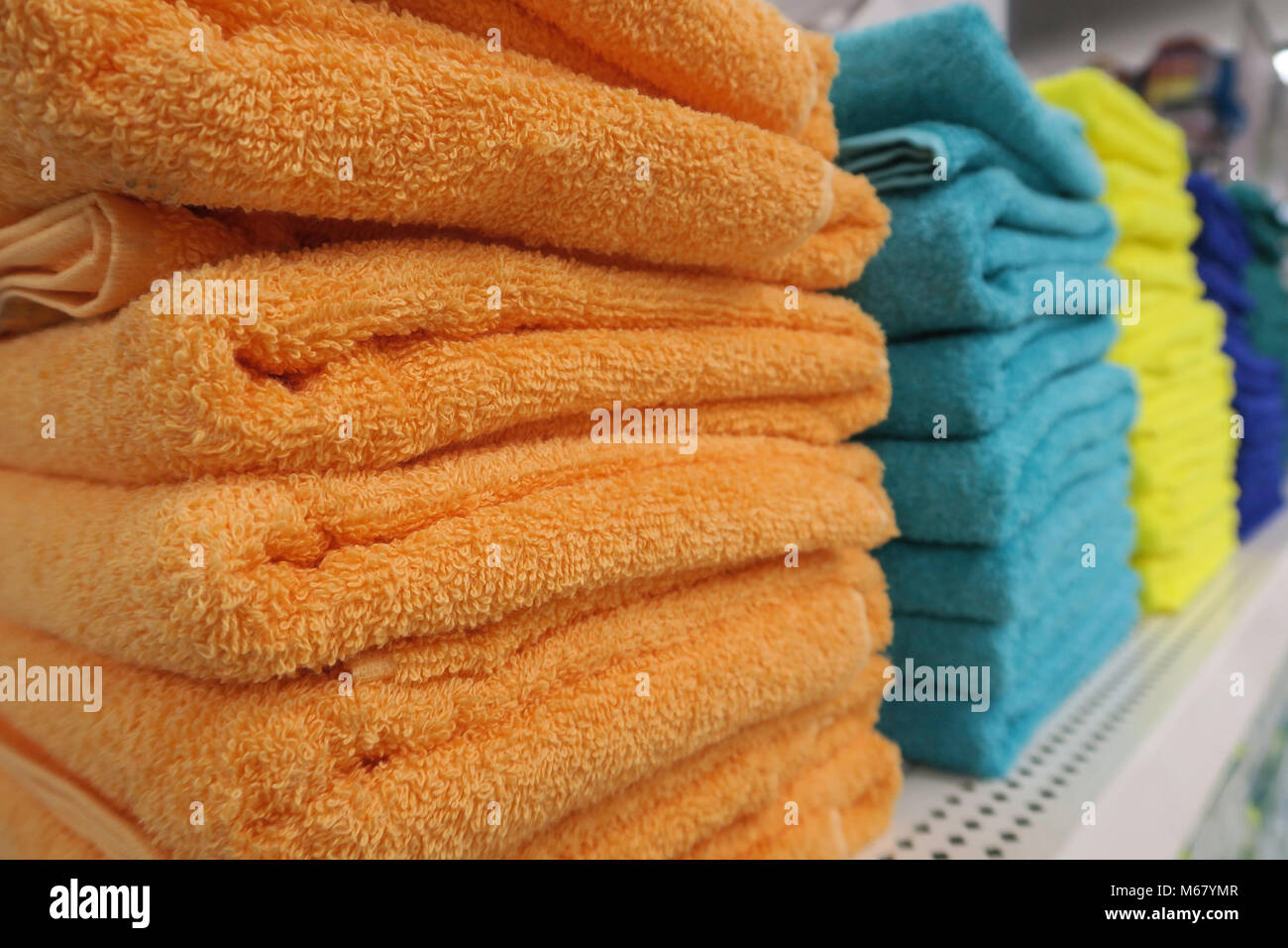 Stacks Of Colorful Towels On Sale Stock Photo Alamy stacks-of-colorful-towels-on-sale-stock-photo-alamy
