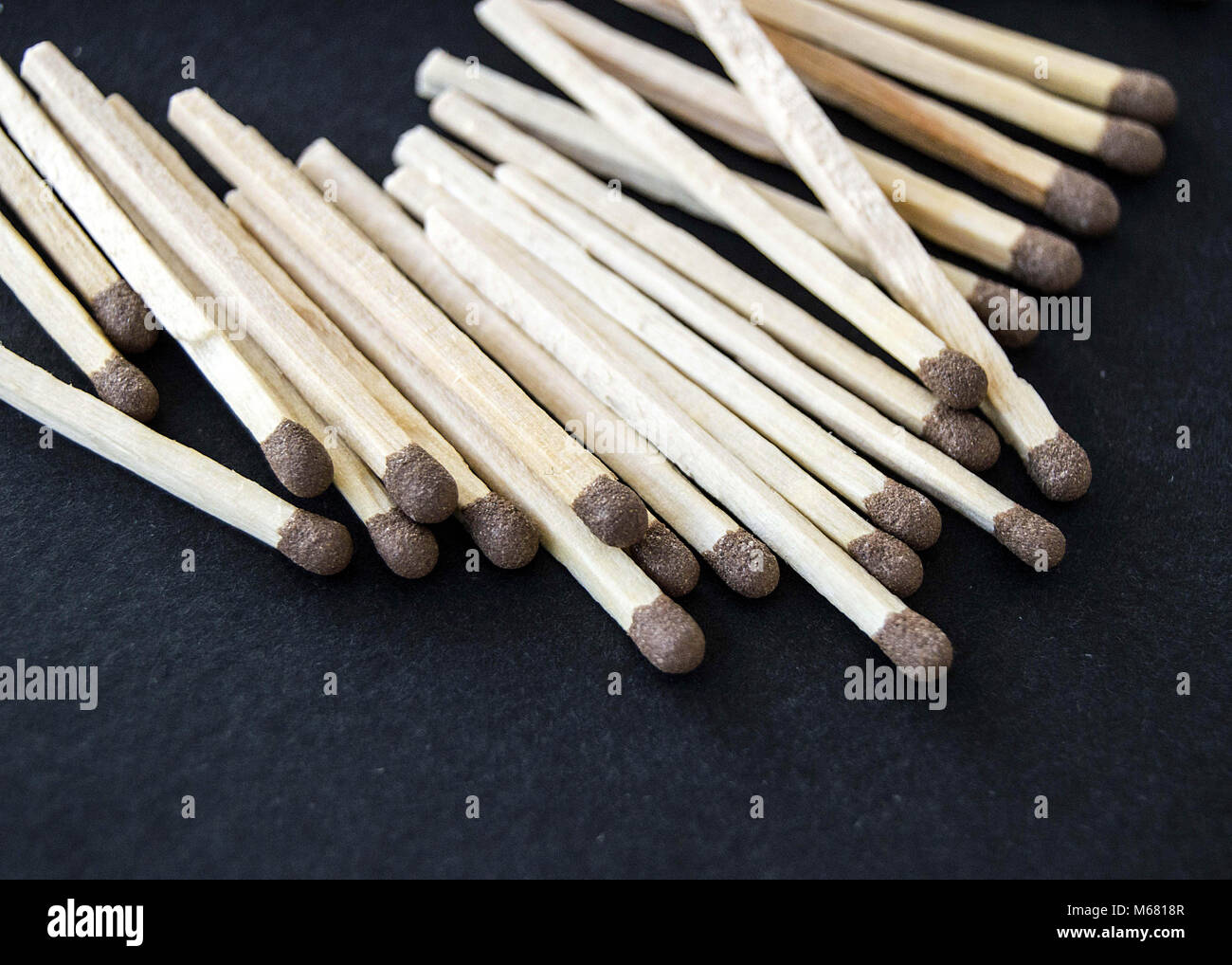 There are dozens of matchsticks that are scattered,there are dozens of ...