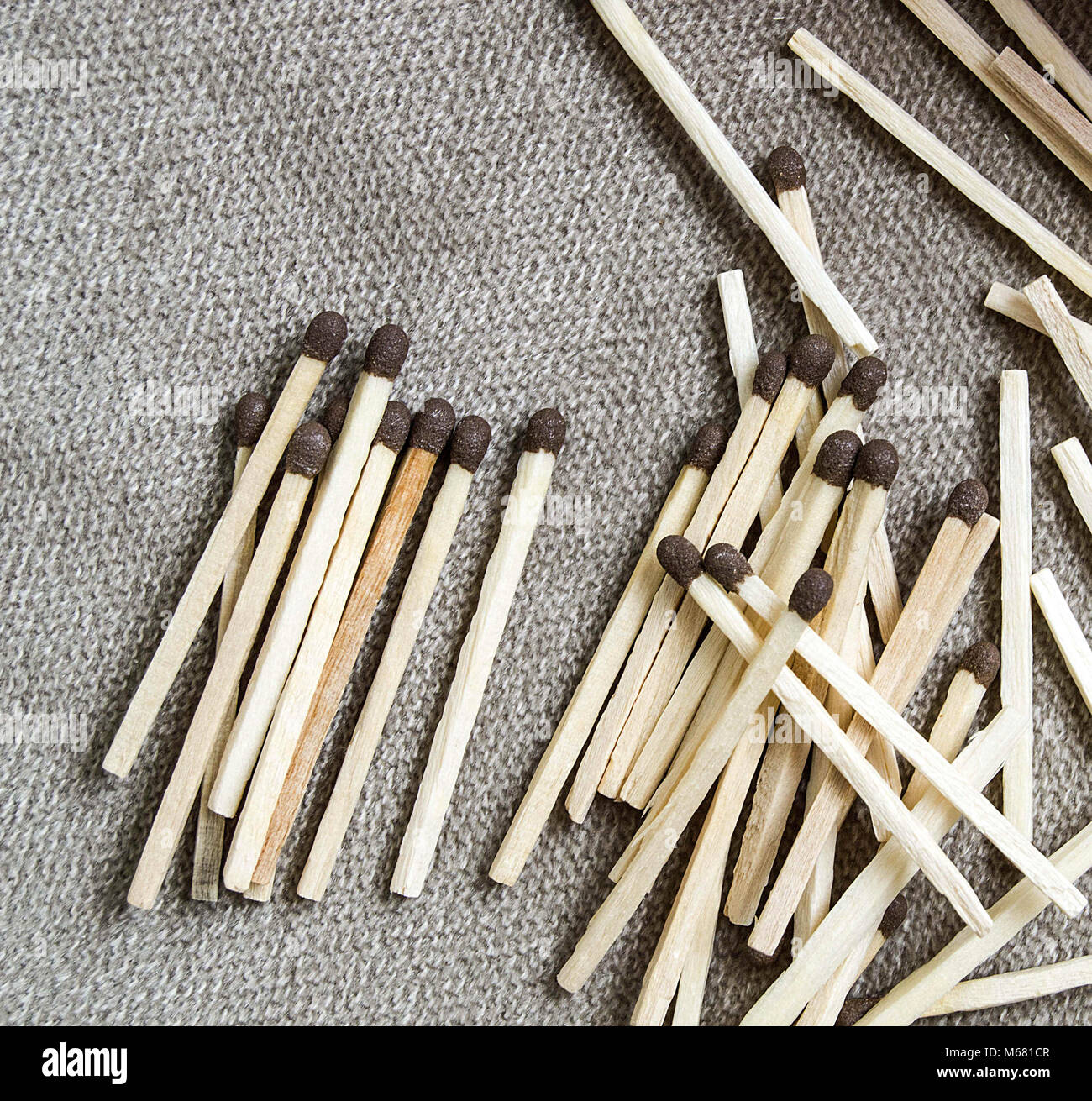 There are dozens of matchsticks that are scattered,there are dozens of ...