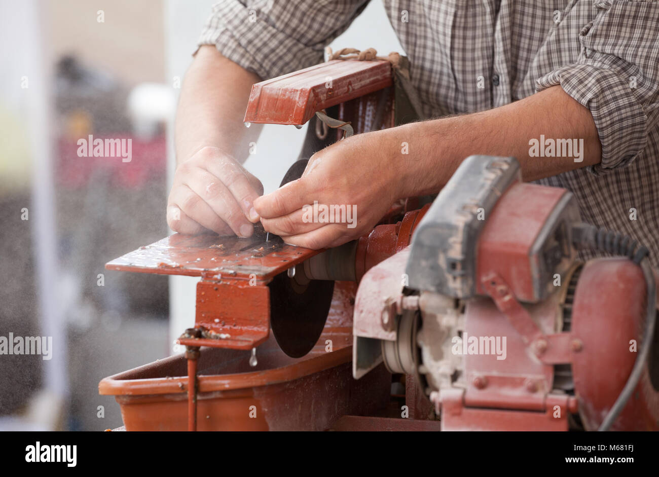 Hand cutting stone hi-res stock photography and images - Alamy