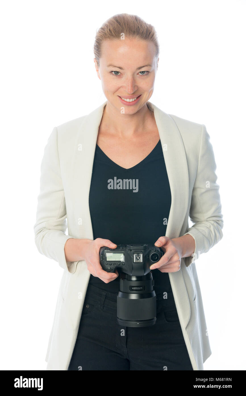 Woman photographer takes images with dslr camera Stock Photo - Alamy