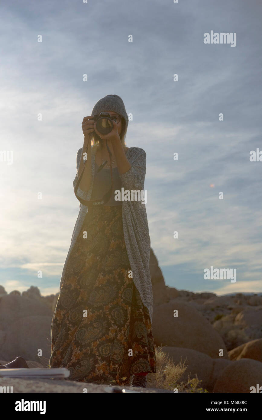 Photographer at sunset Stock Photo - Alamy