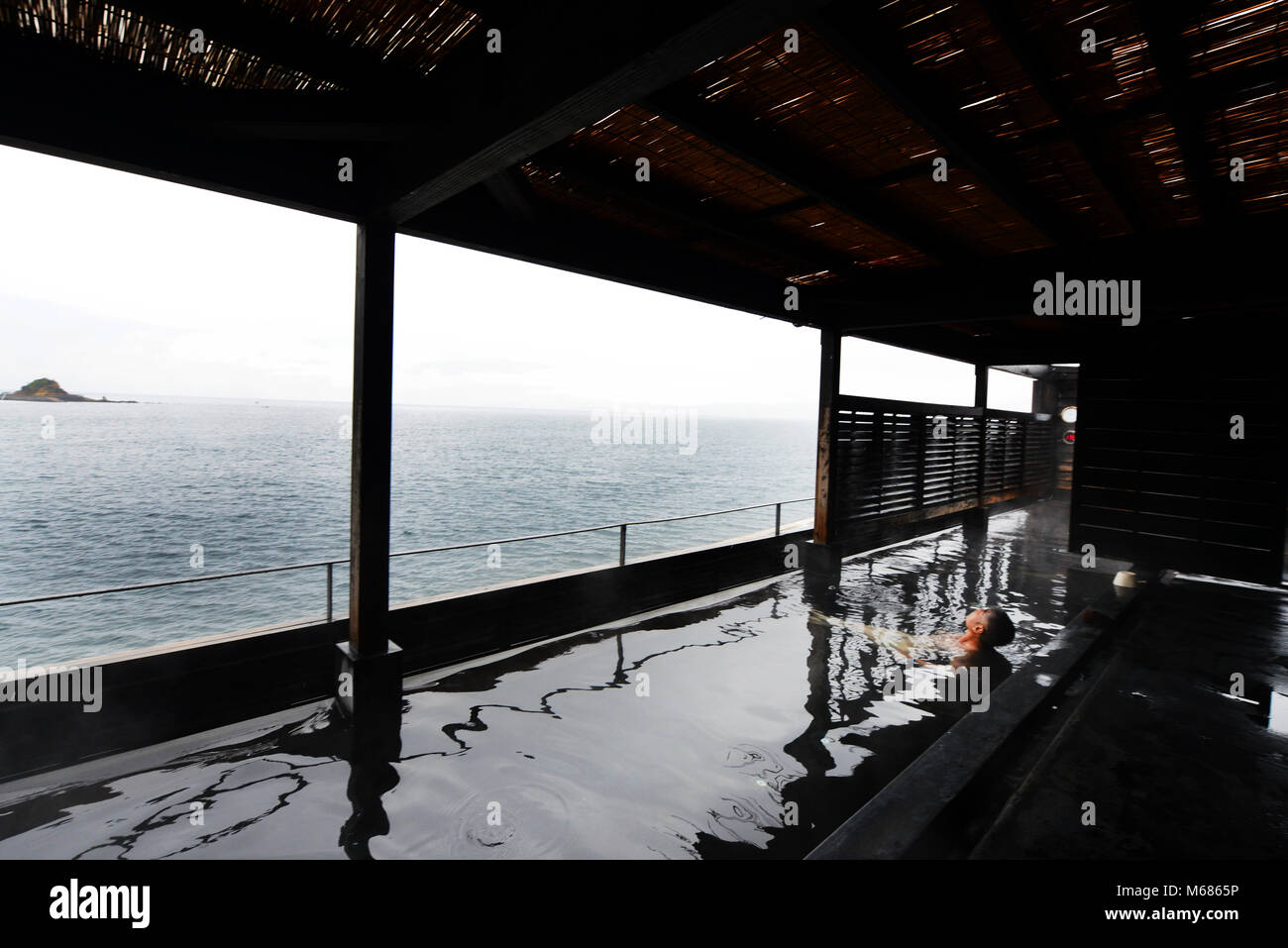 A traditional Japanese hot spring spa by the ocean Stock Photo - Alamy