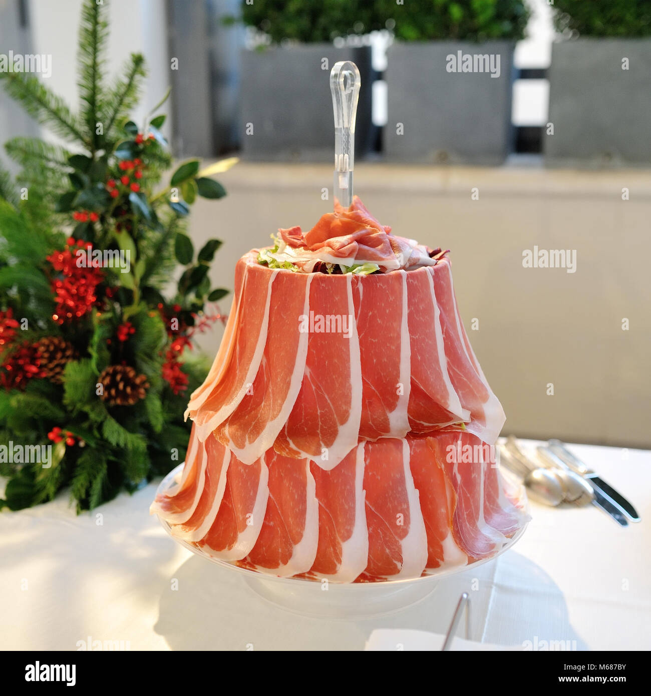 Italian ham sliced - tasty delicious appetizer Stock Photo - Alamy
