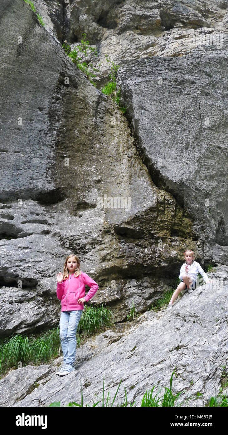 Child scaling rocks hi-res stock photography and images - Alamy