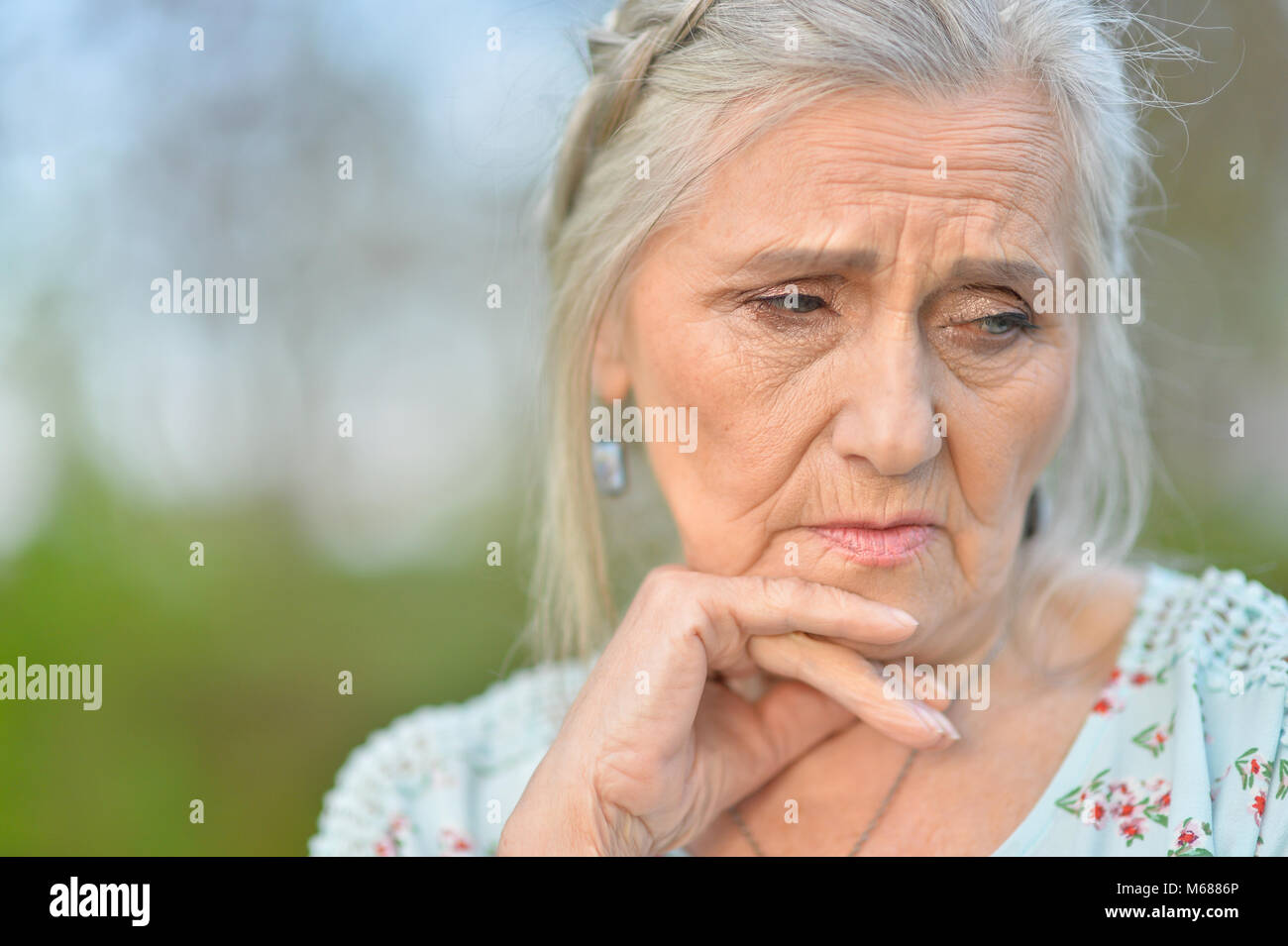sad senior beautiful woman Stock Photo - Alamy
