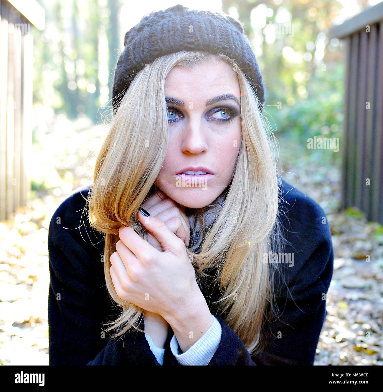 Beautiful woman posing hands face hi-res stock photography and images ...