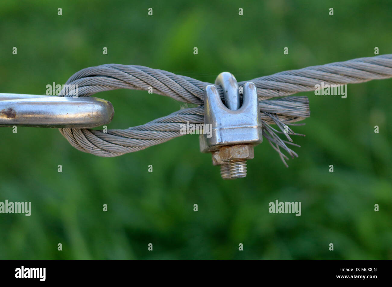 Wire cable clamps Stock Photo - Alamy