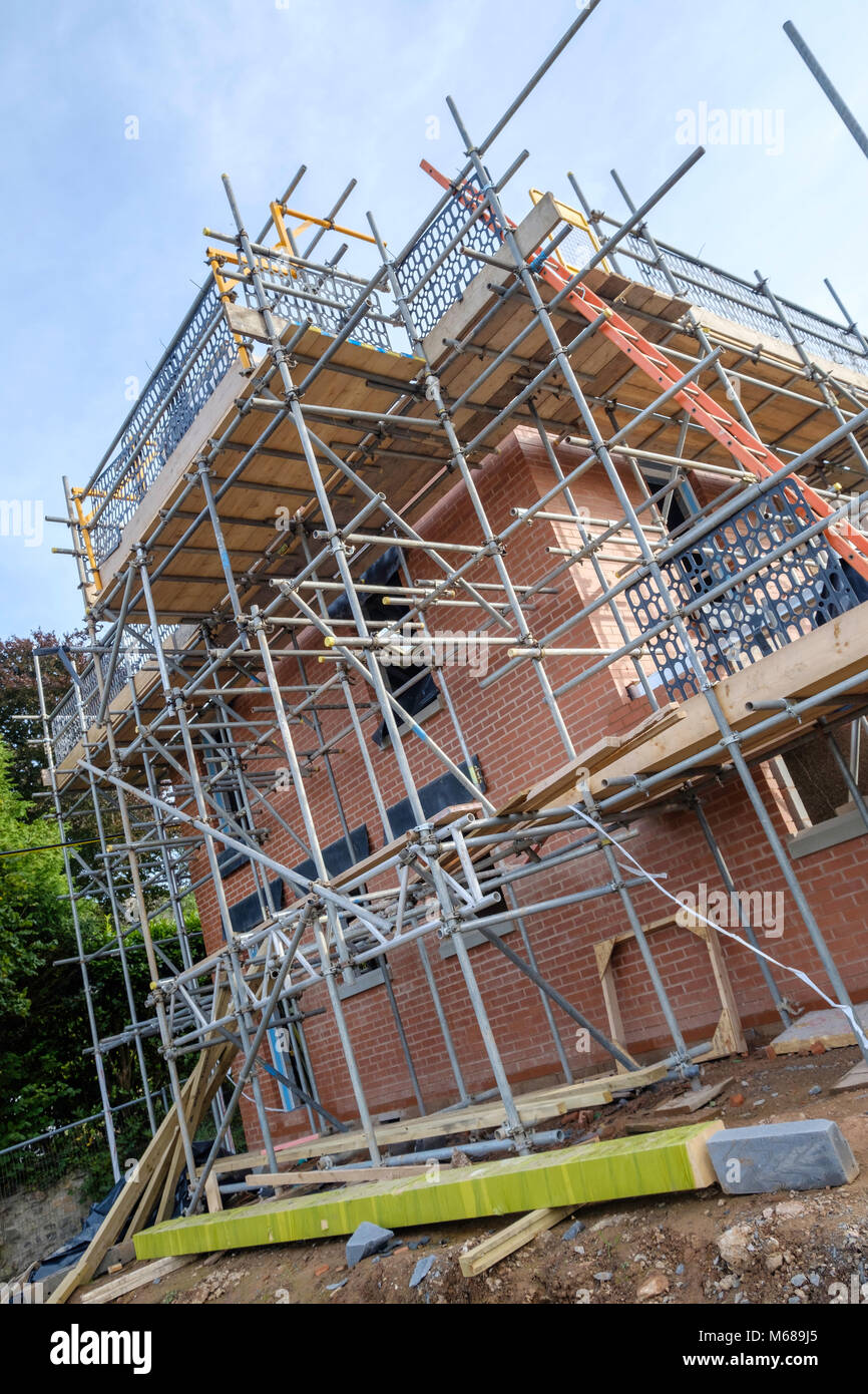 Extension being built on house. Scaffolding in place. Gloucestershire ...